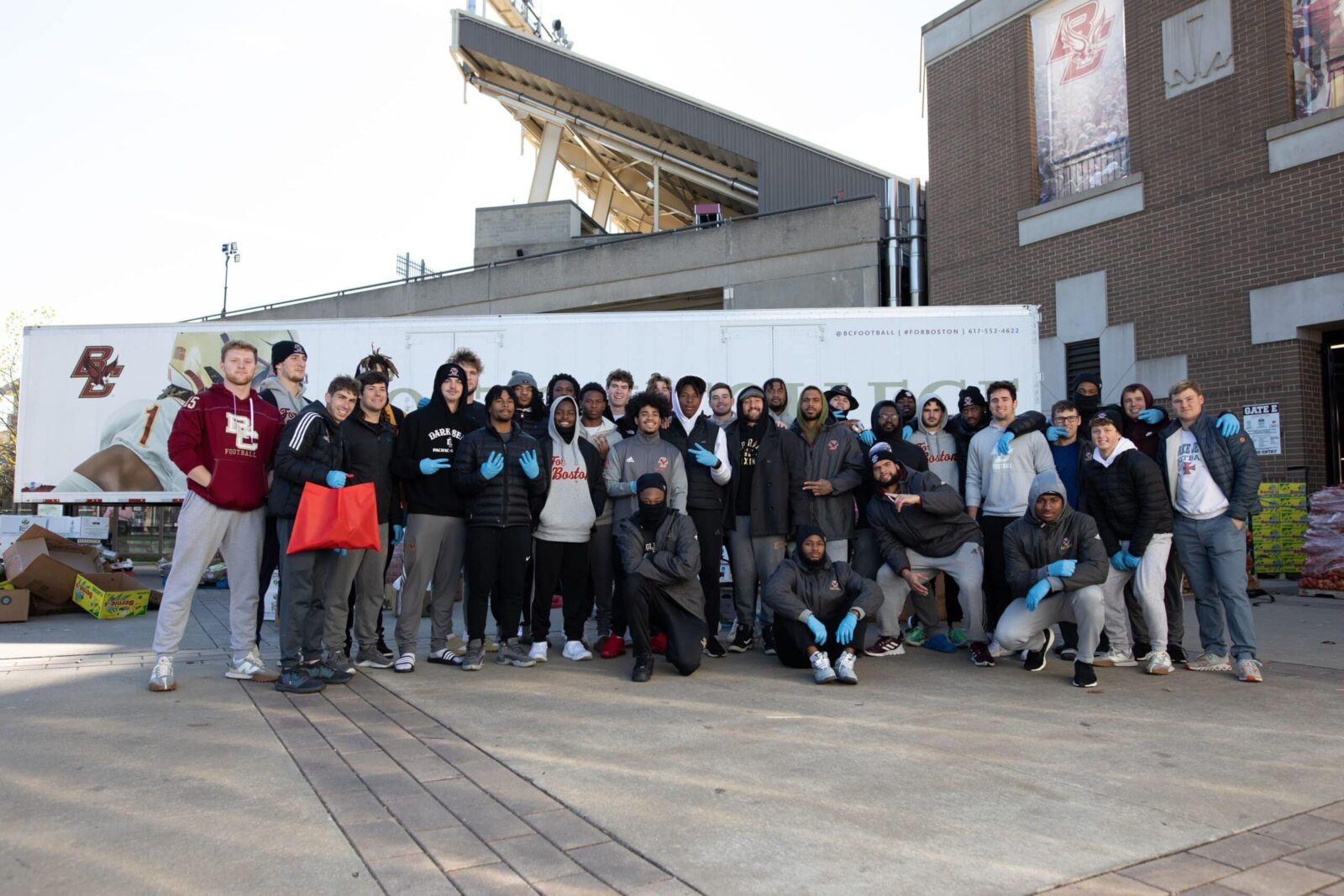 Boston College Athletic Teams Pack Bags for Catholic Charities' Food ...